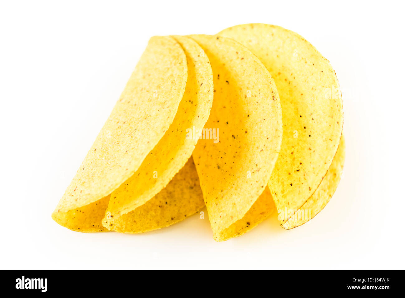 Yellow corn taco shells on a white background Stock Photo - Alamy