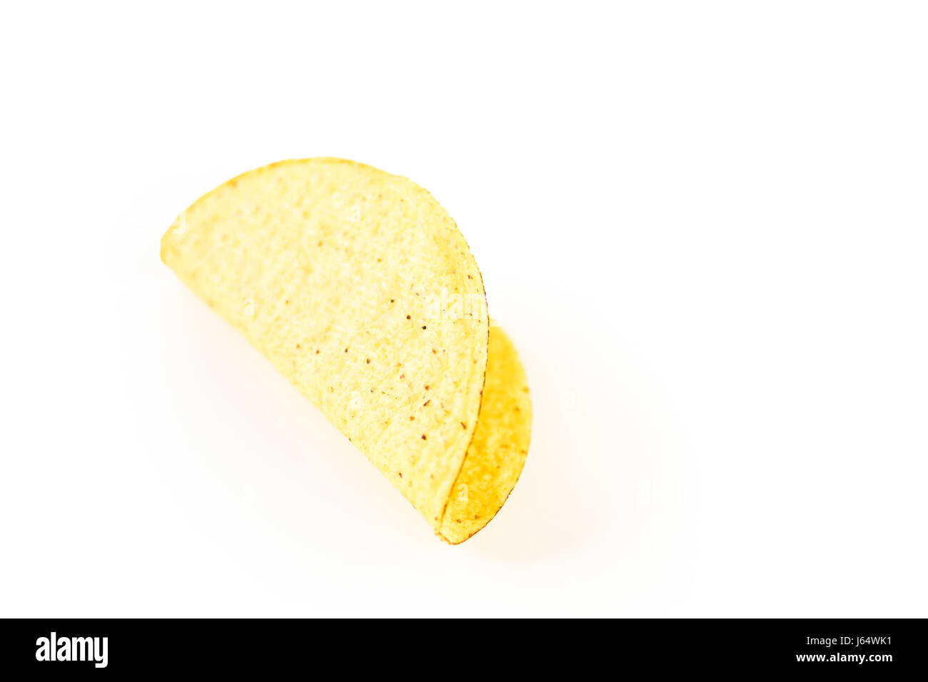 Yellow corn taco shells on a white background Stock Photo - Alamy