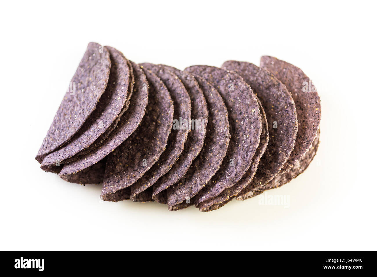 Blue corn taco shells on a white background Stock Photo - Alamy