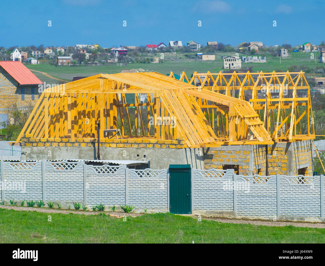 Wooden skeleton of the roof of the house under construction Stock Photo ...