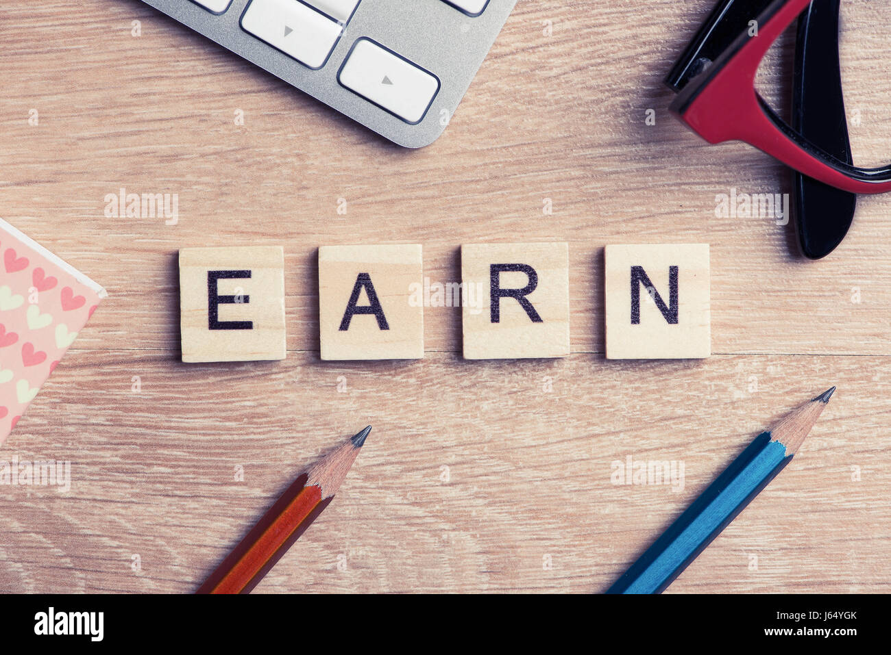 Elements of game with letters spelling business keywords on work Stock ...