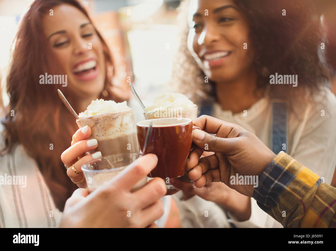 Group friends drinking milkshakes hi-res stock photography and images ...