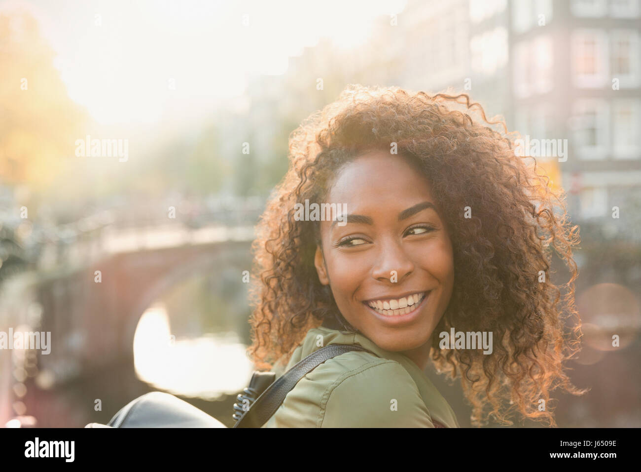 Turning looking back over shoulder hi-res stock photography and images ...