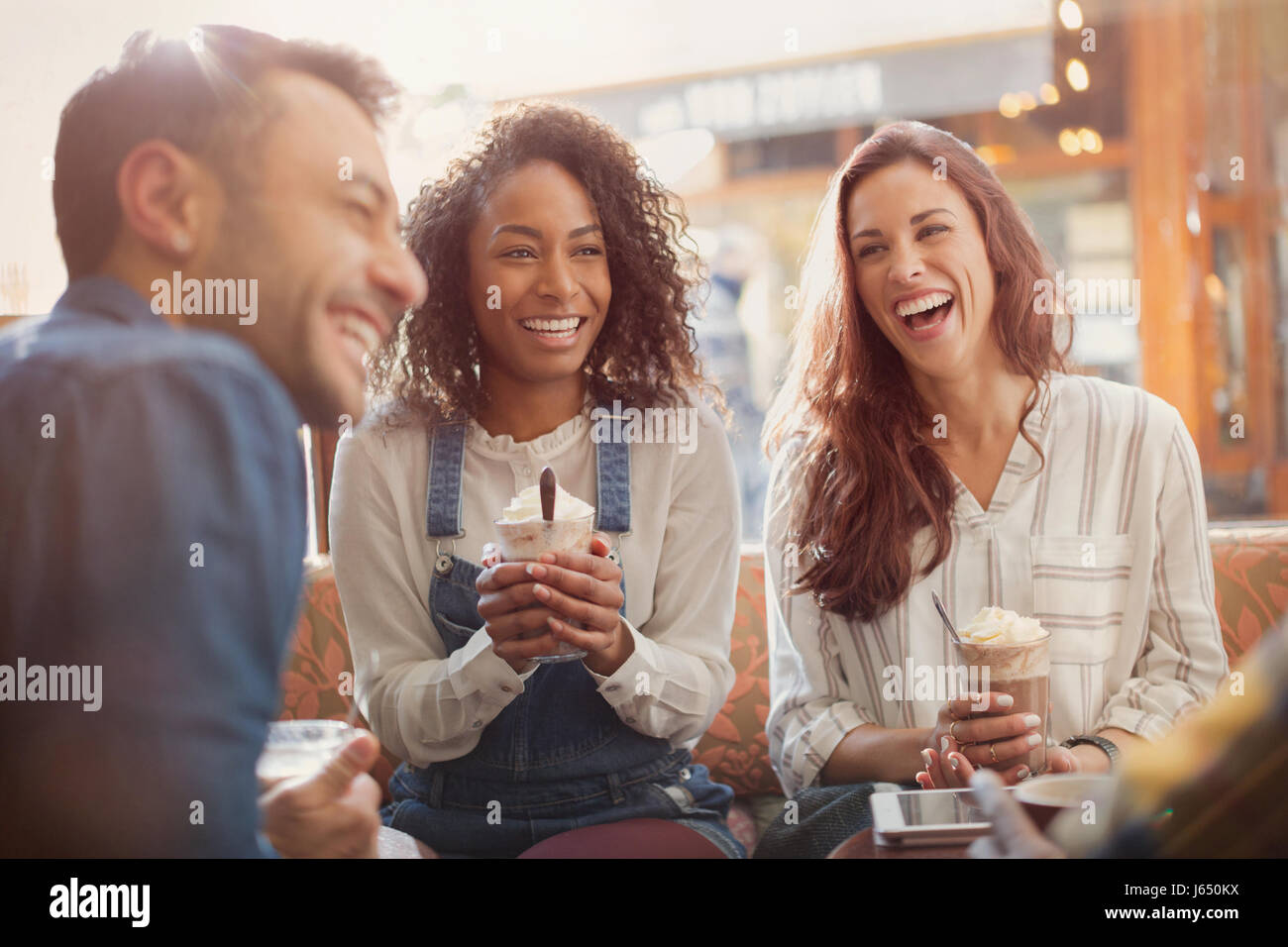 Group friends drinking milkshakes hi-res stock photography and images ...
