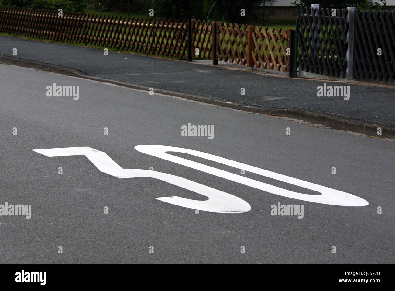 asphalt track residential area thirty speed limit street road speed ...