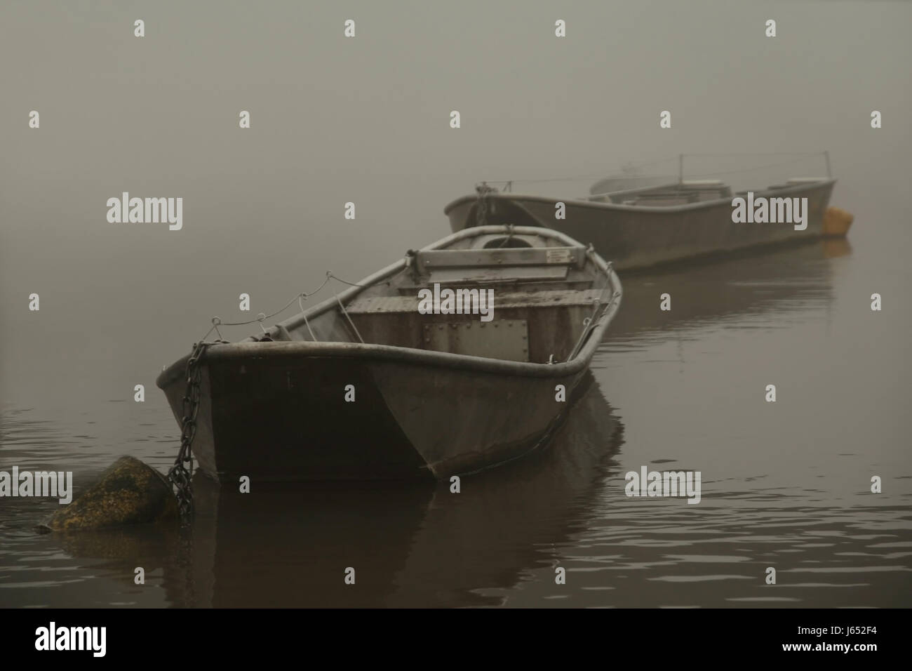 fog mood dismal fishery grey gray river water rowing boat sailing boat ...