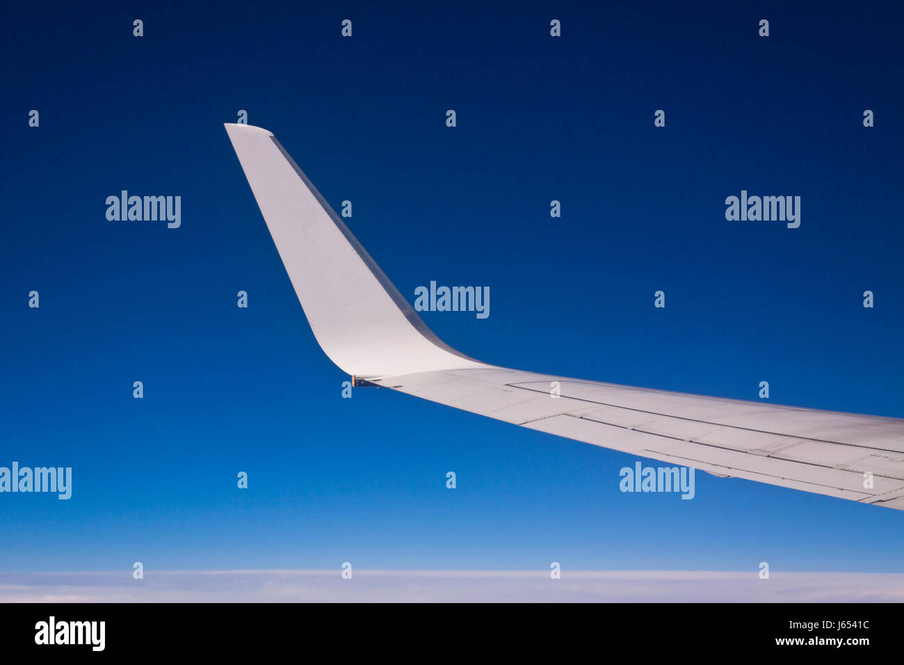 Airplane Wing in Flight Stock Photo - Alamy