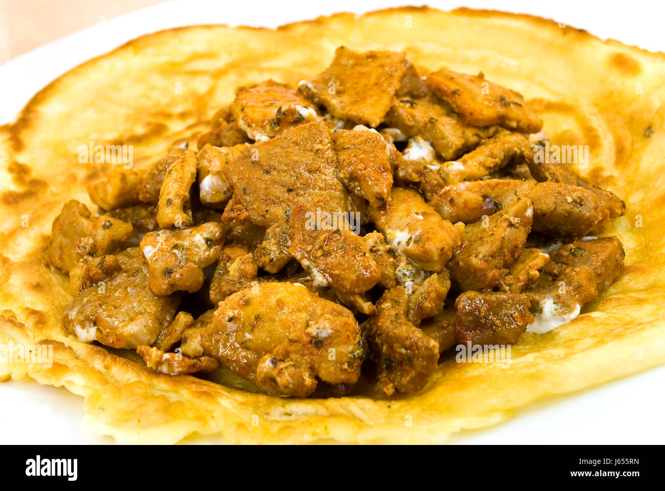 greek meat cut into stripes pork food aliment greek boil cooks boiling ...