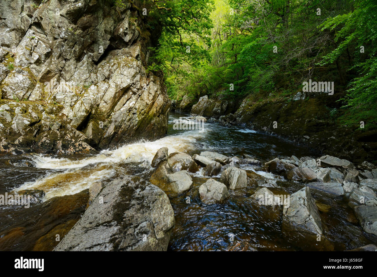 Afon Conwy flowing through the gorge below the Conway Falls. From its ...