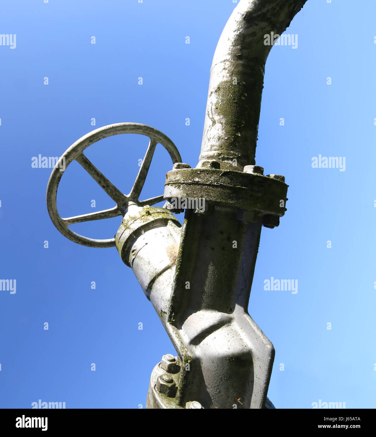 huge tap with the shutoff valve of the pipe Stock Photo - Alamy
