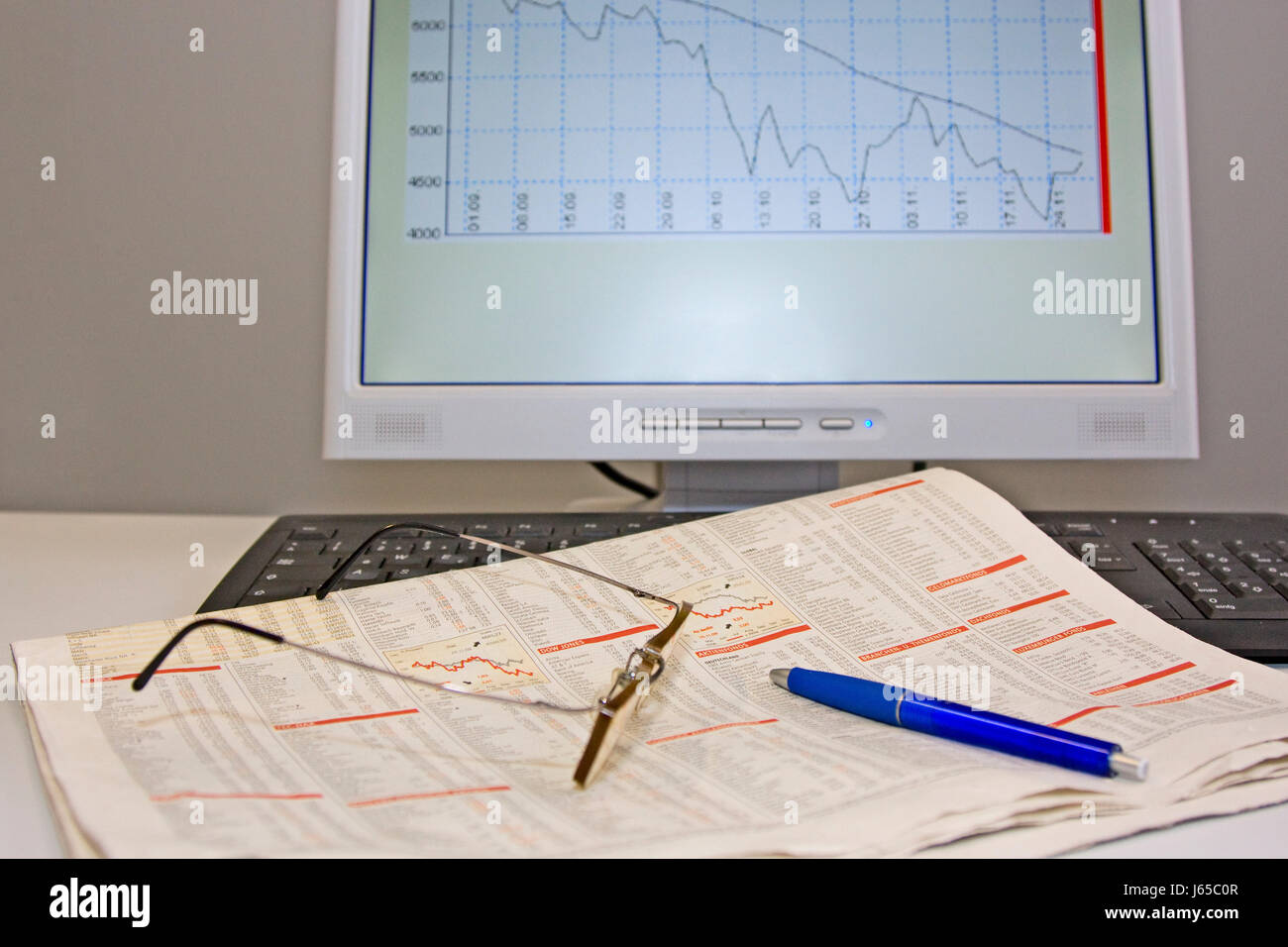 newspaper journal monitor screen price of shares decreasing computers ...