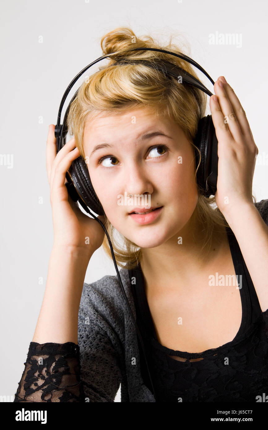 woman music enjoy earphones headphones listening young younger girl ...