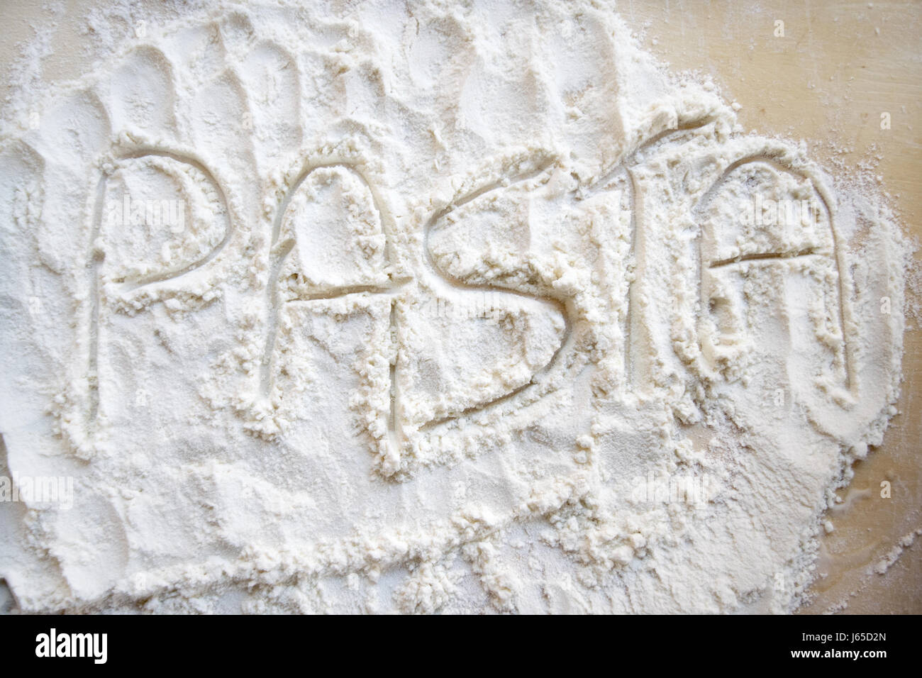 the word pasta written in the flour Stock Photo - Alamy