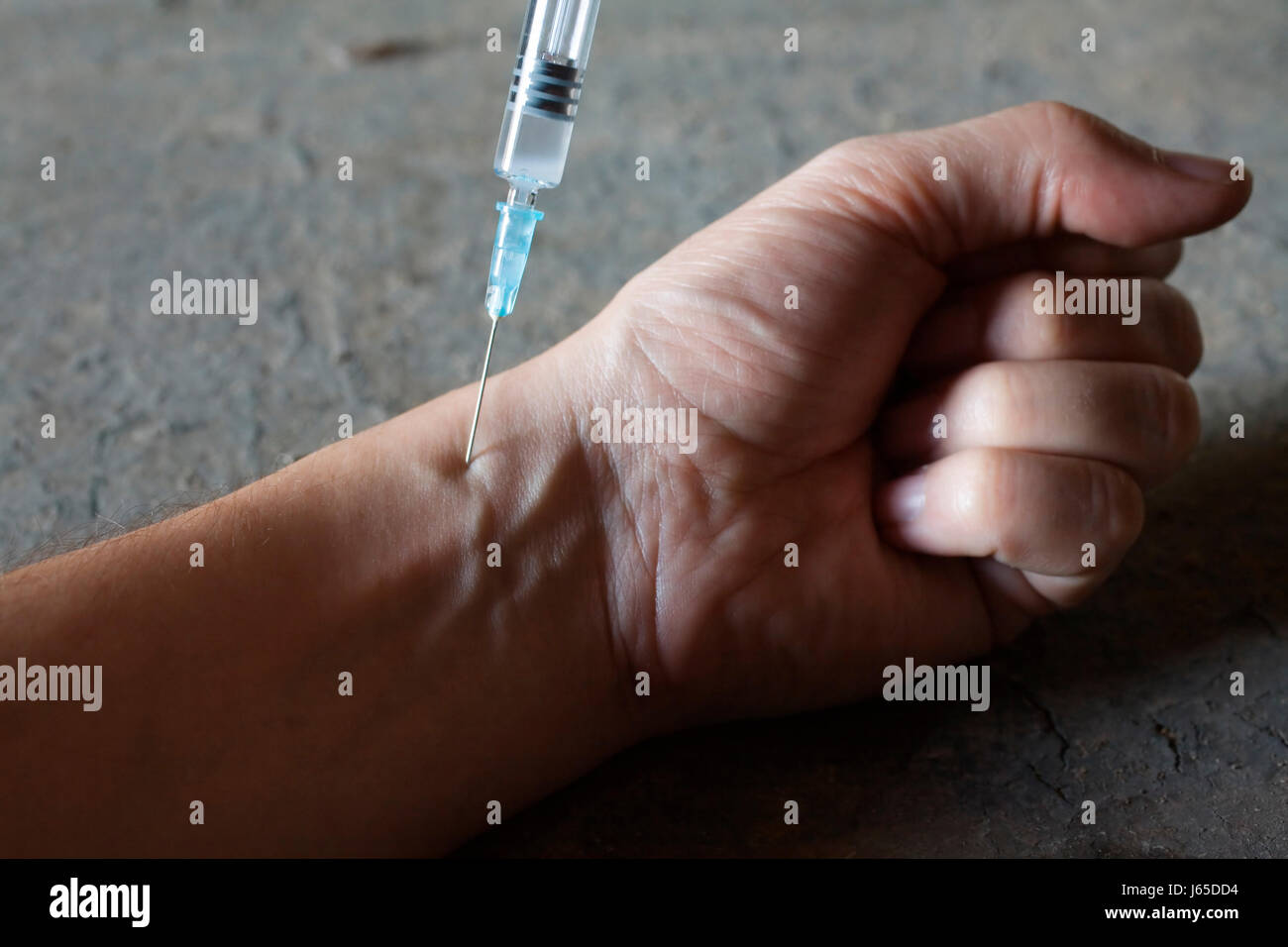 injection needle on hand Stock Photo - Alamy