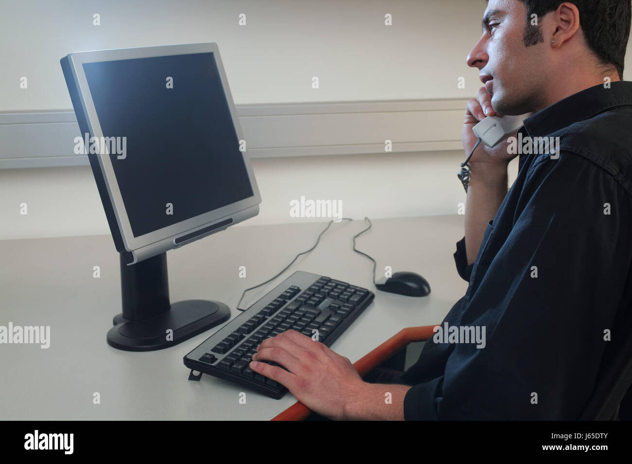 telephone phone desk salesman salesperson computers computer man hand ...