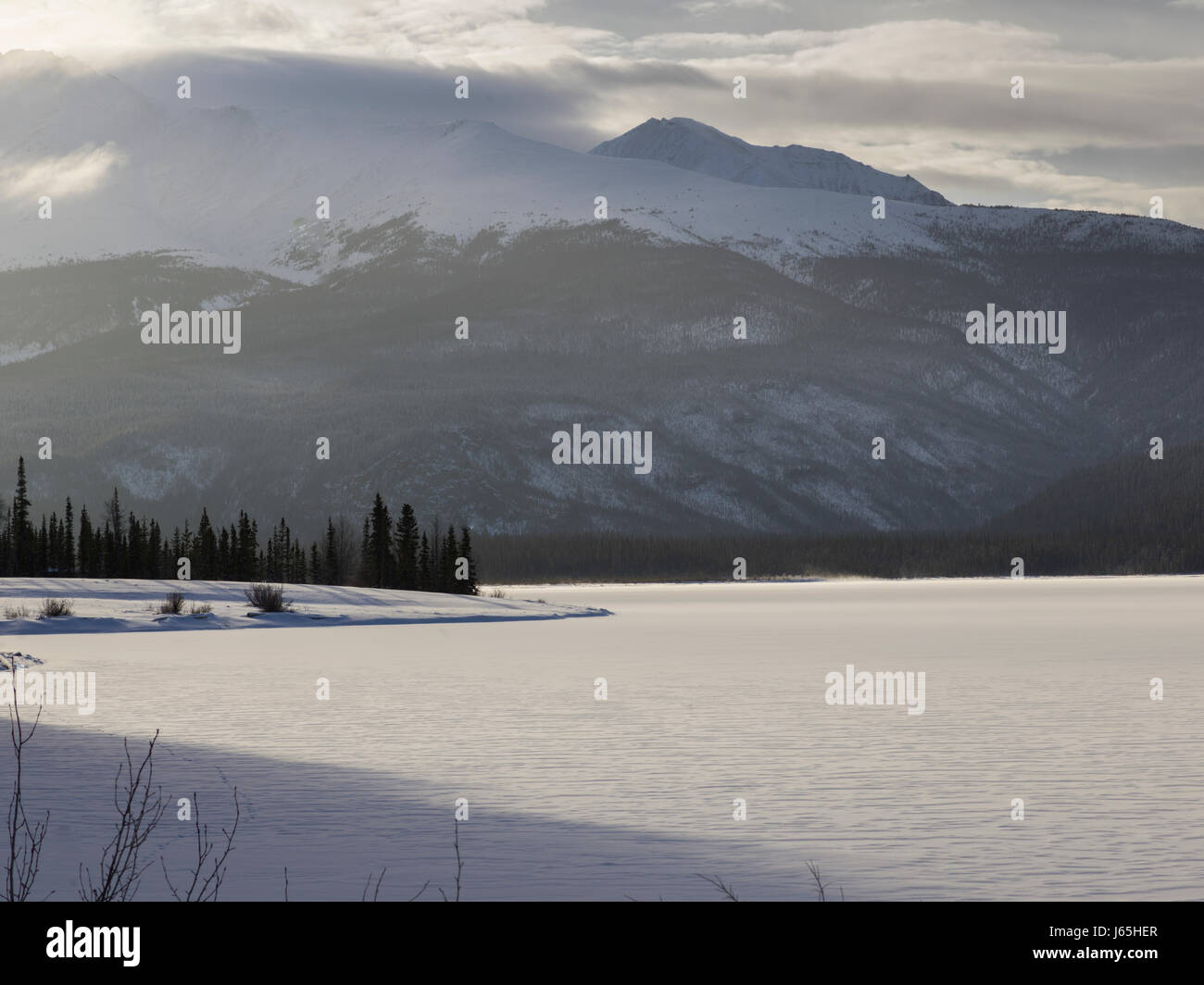 Lake with mountain range in the background, Muncho Lake, Muncho Lake ...