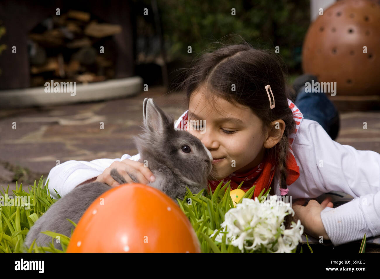 easter spring easter egg smooch egg child cuddling girl girls kiss ...