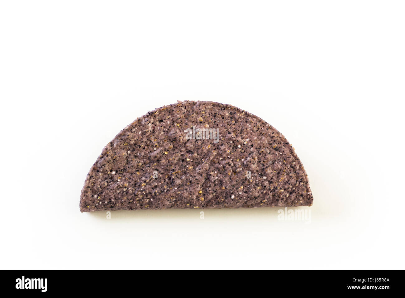 Blue corn taco shells on a white background Stock Photo - Alamy