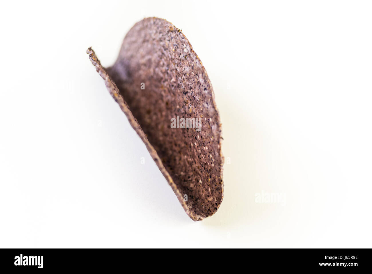 Blue corn taco shells on a white background Stock Photo - Alamy