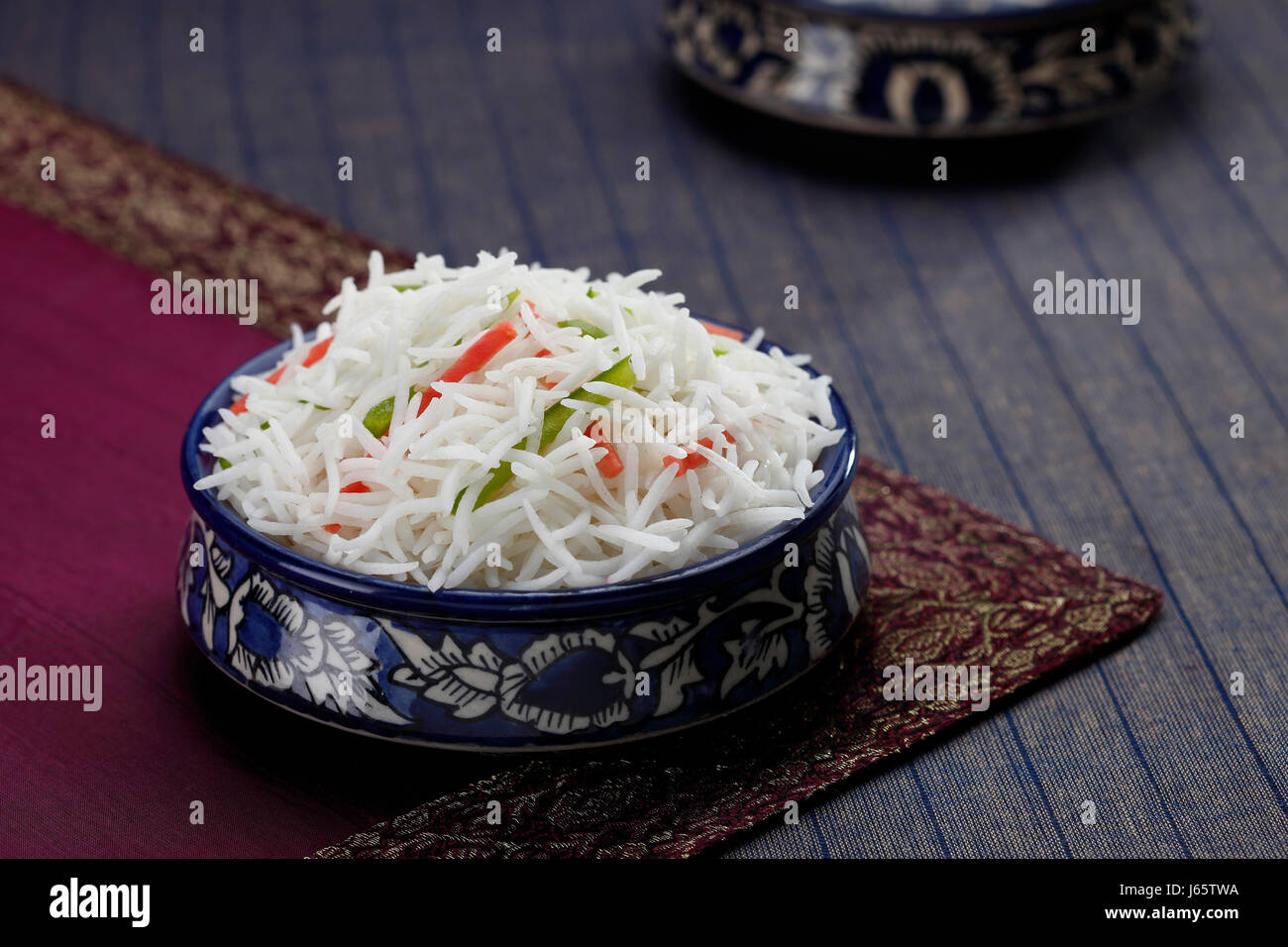 Indian Basmati Rice in a bowl, on a dark background Stock Photo - Alamy