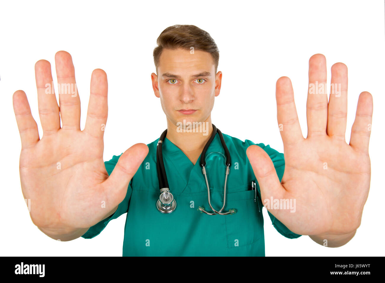 Male doctor warning with his hands Stock Photo - Alamy