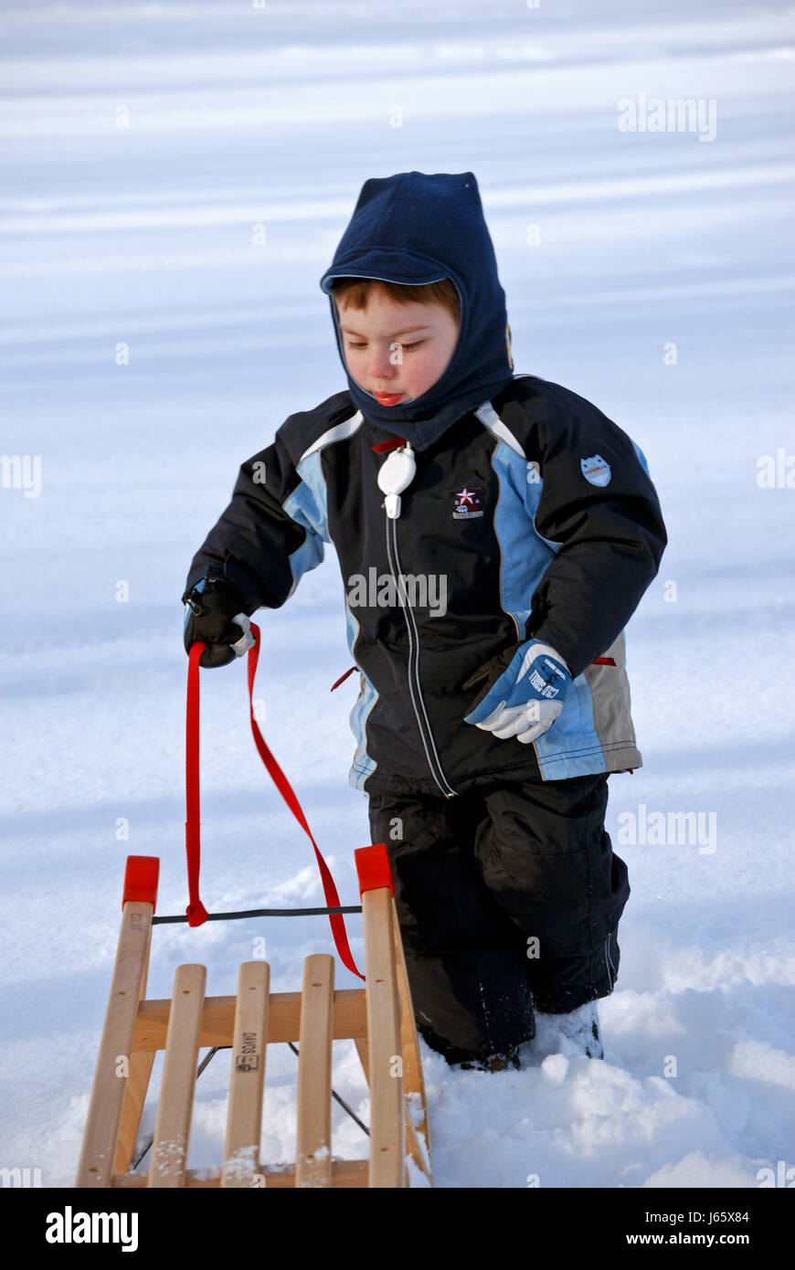sledge young younger snow child toddler spare time free time leisure ...
