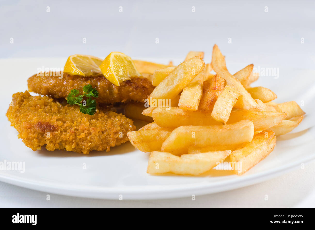 schnitzel with fries Stock Photo - Alamy