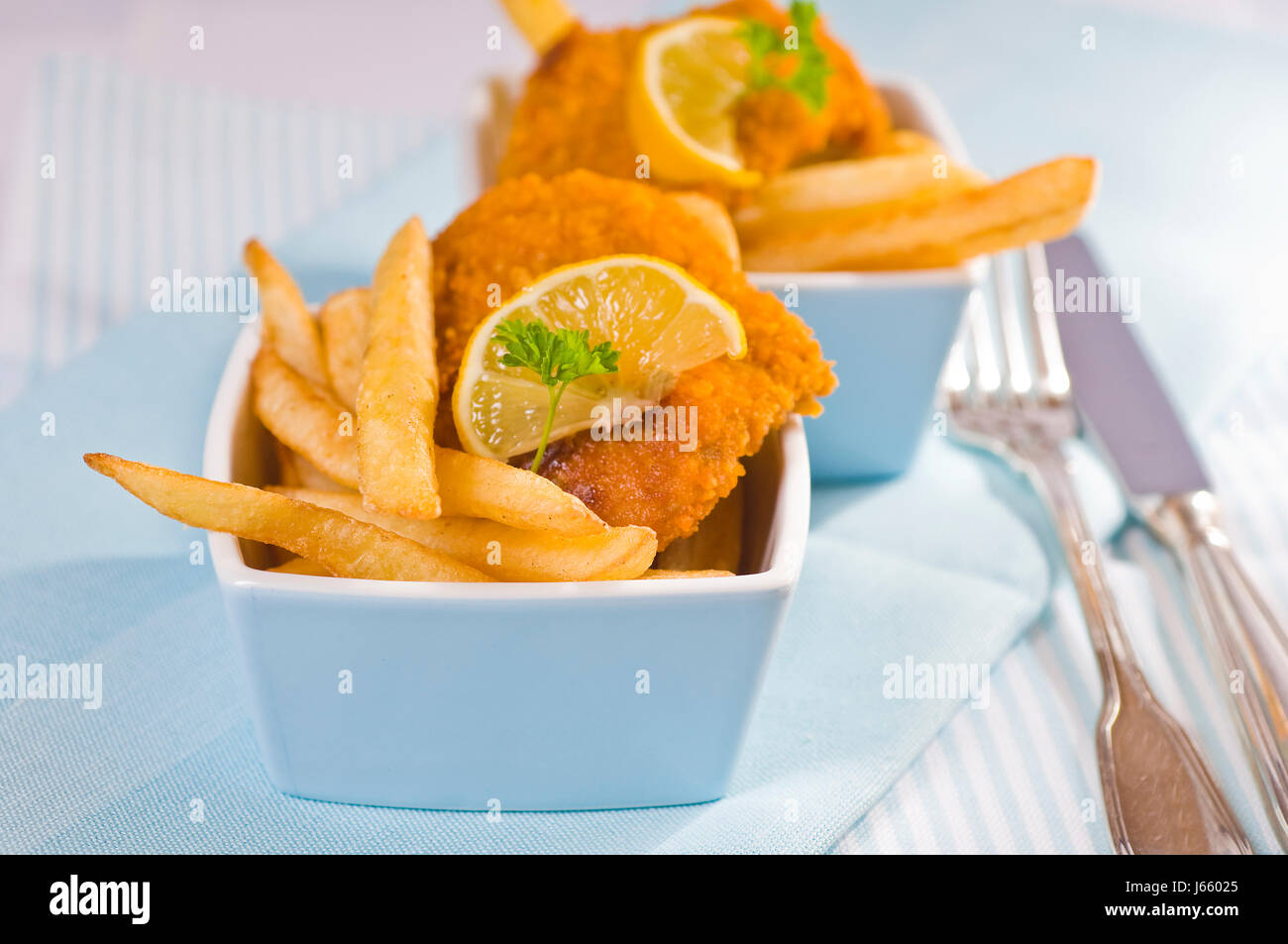 schnitzel with fries Stock Photo - Alamy