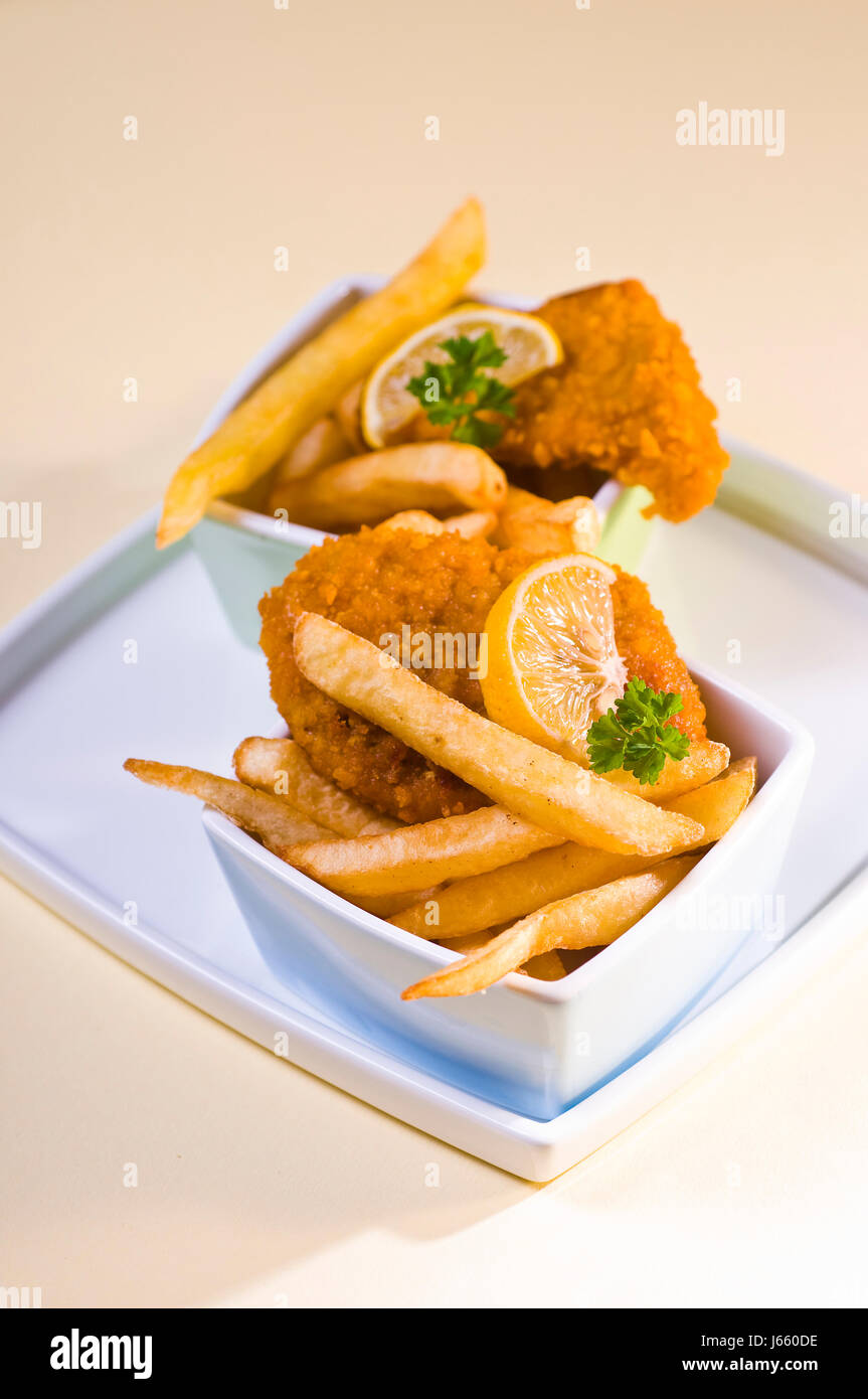 schnitzel with fries Stock Photo - Alamy