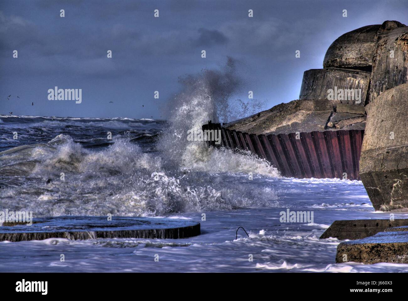 bunker defying the waves Stock Photo - Alamy