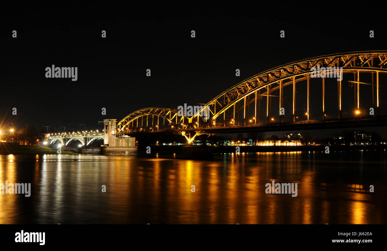 cologne bridge night photograph steel construction arched bridge ...