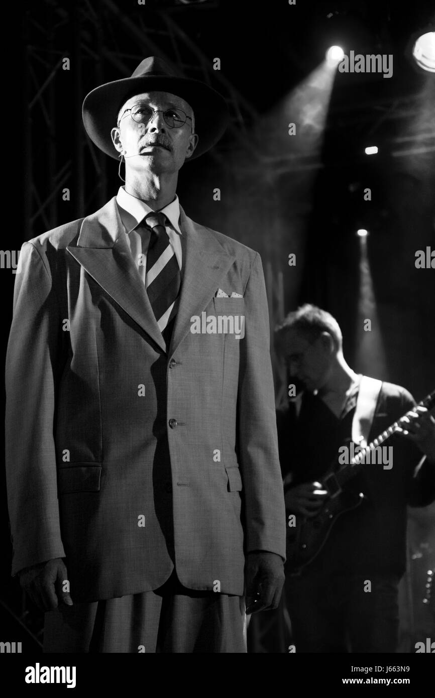 concert music headlight speaker narrator hat reflector suit man ...