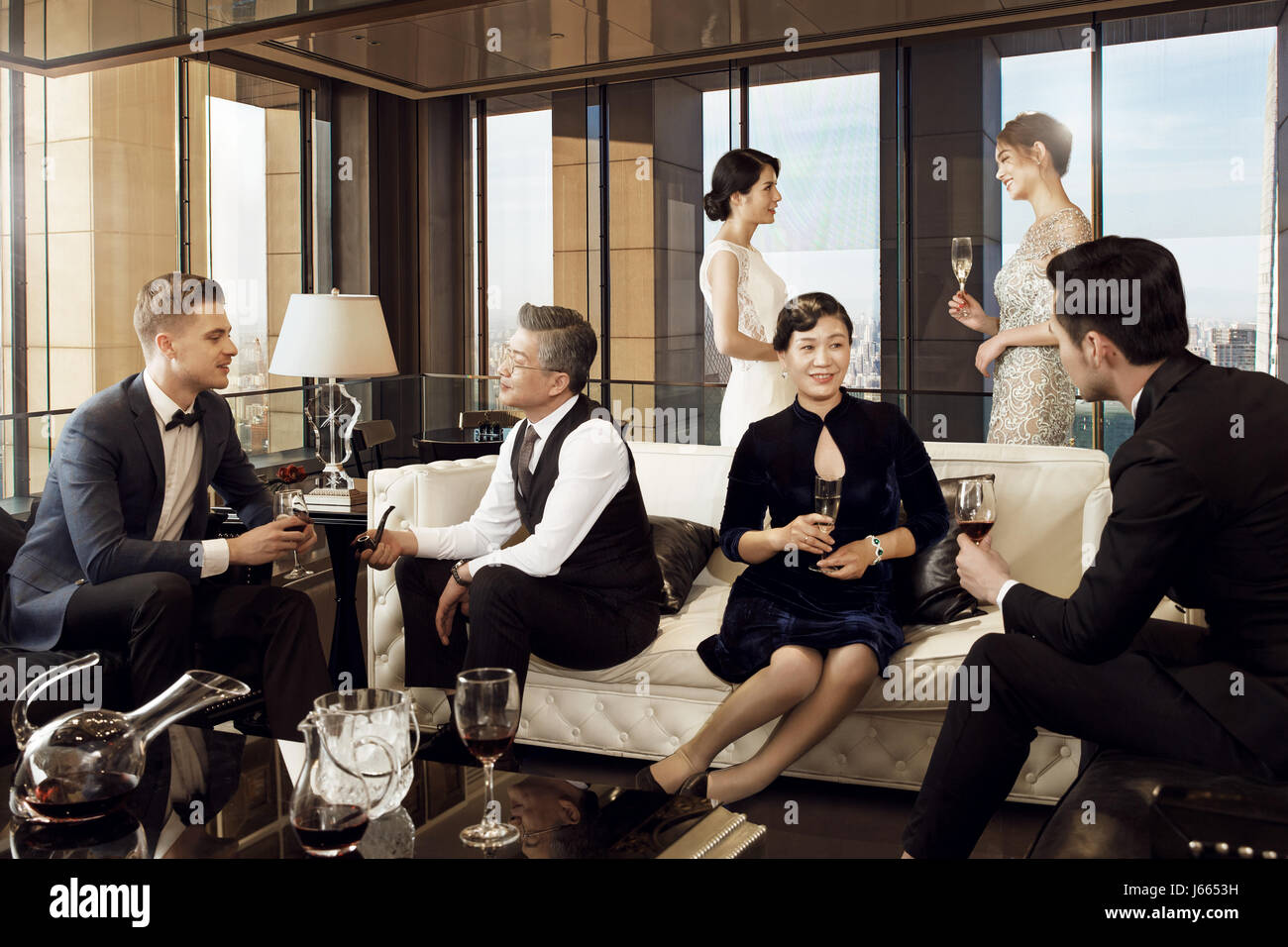 Business people gathering Stock Photo - Alamy