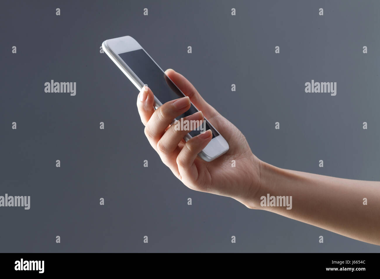 Hand holding mobile phone Stock Photo - Alamy