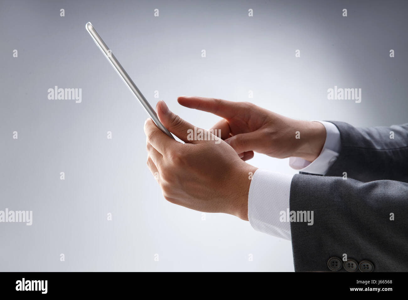 The use of tablet computer Stock Photo - Alamy