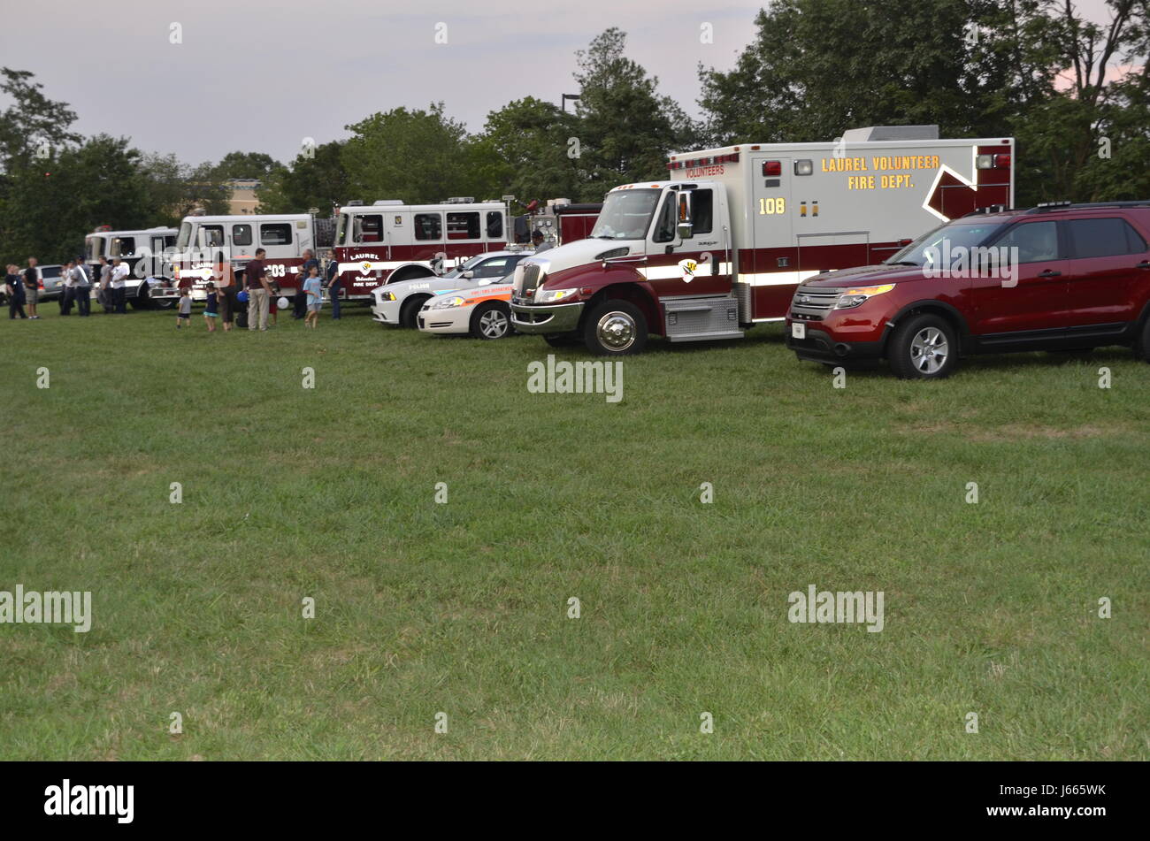 police and rescue vehicles are lined up at July4 celebration Stock ...