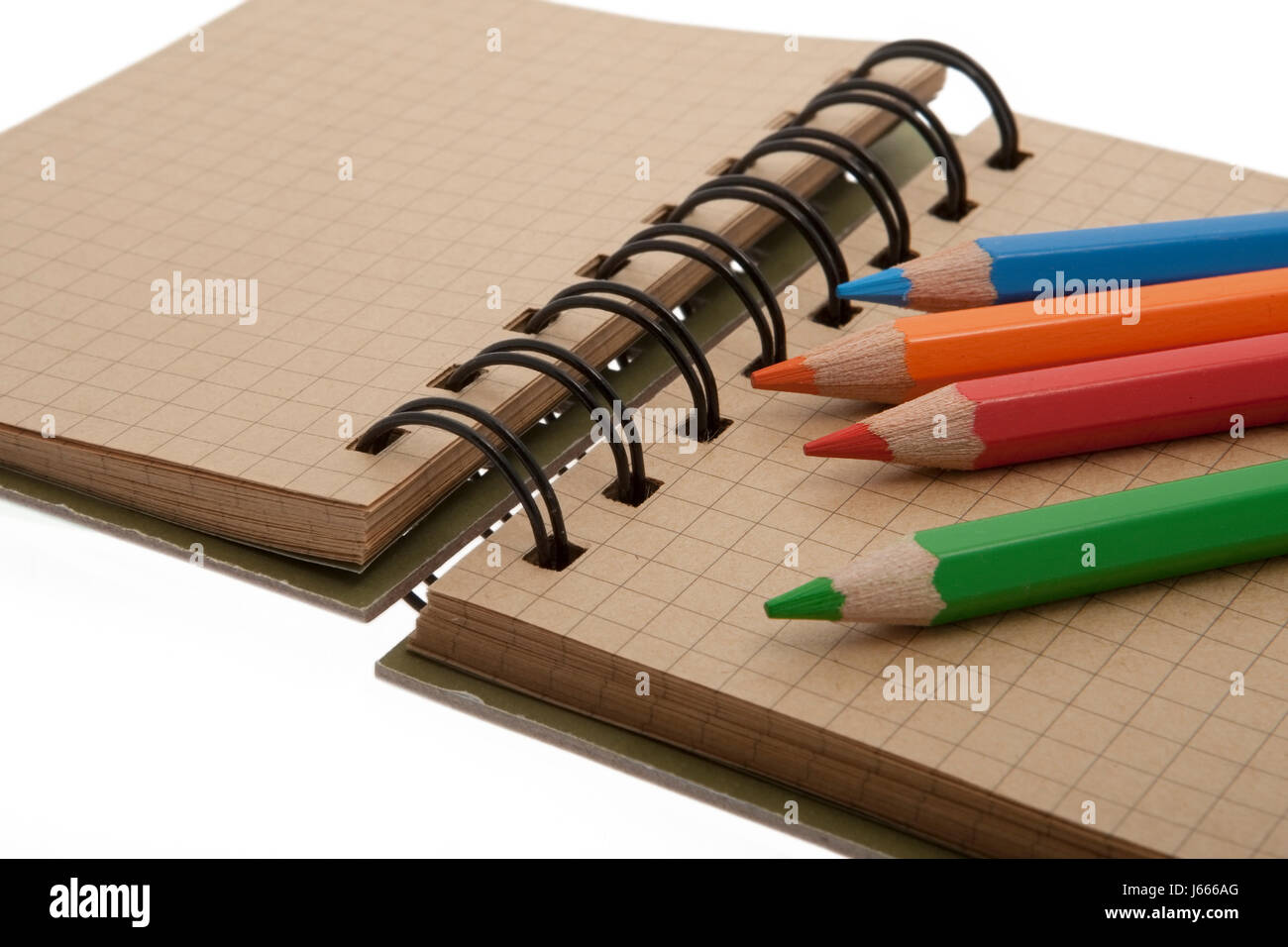 notepad with crayons Stock Photo - Alamy