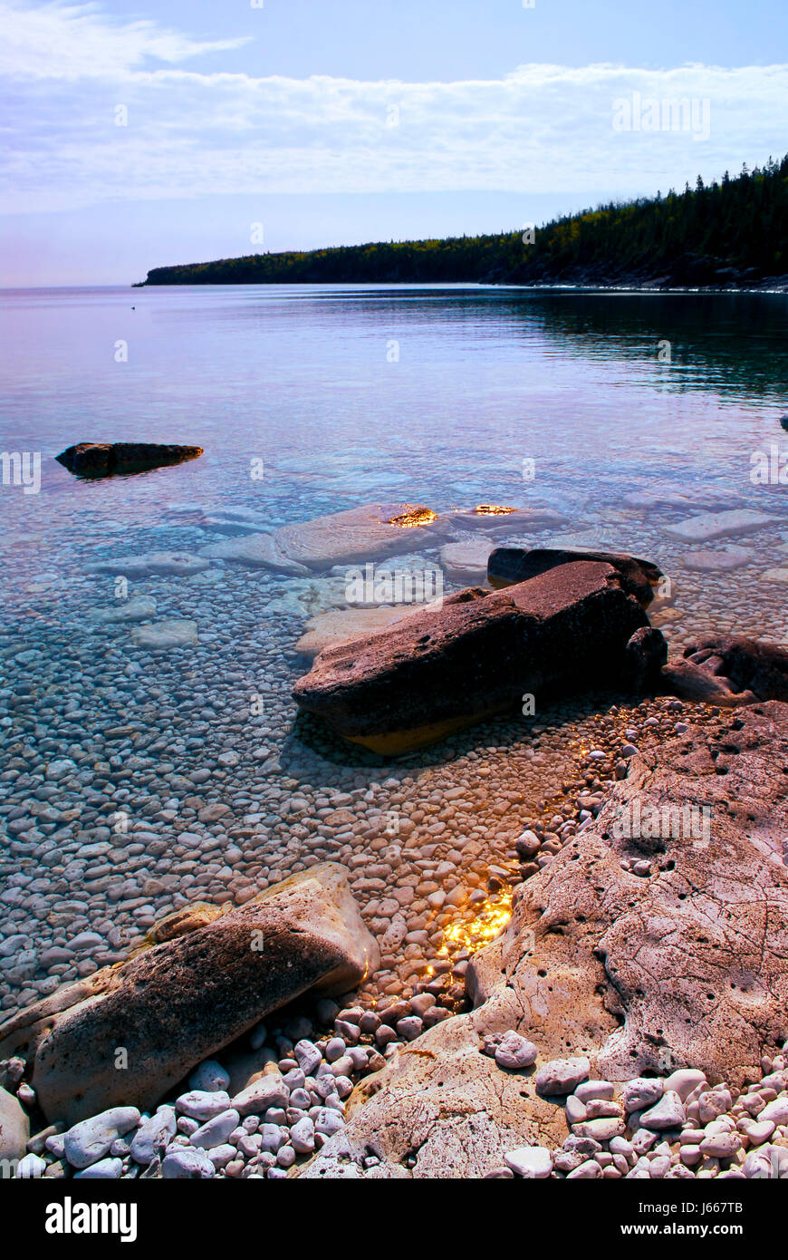 coast fresh water lake inland water water boulder scenic rocks nature ...