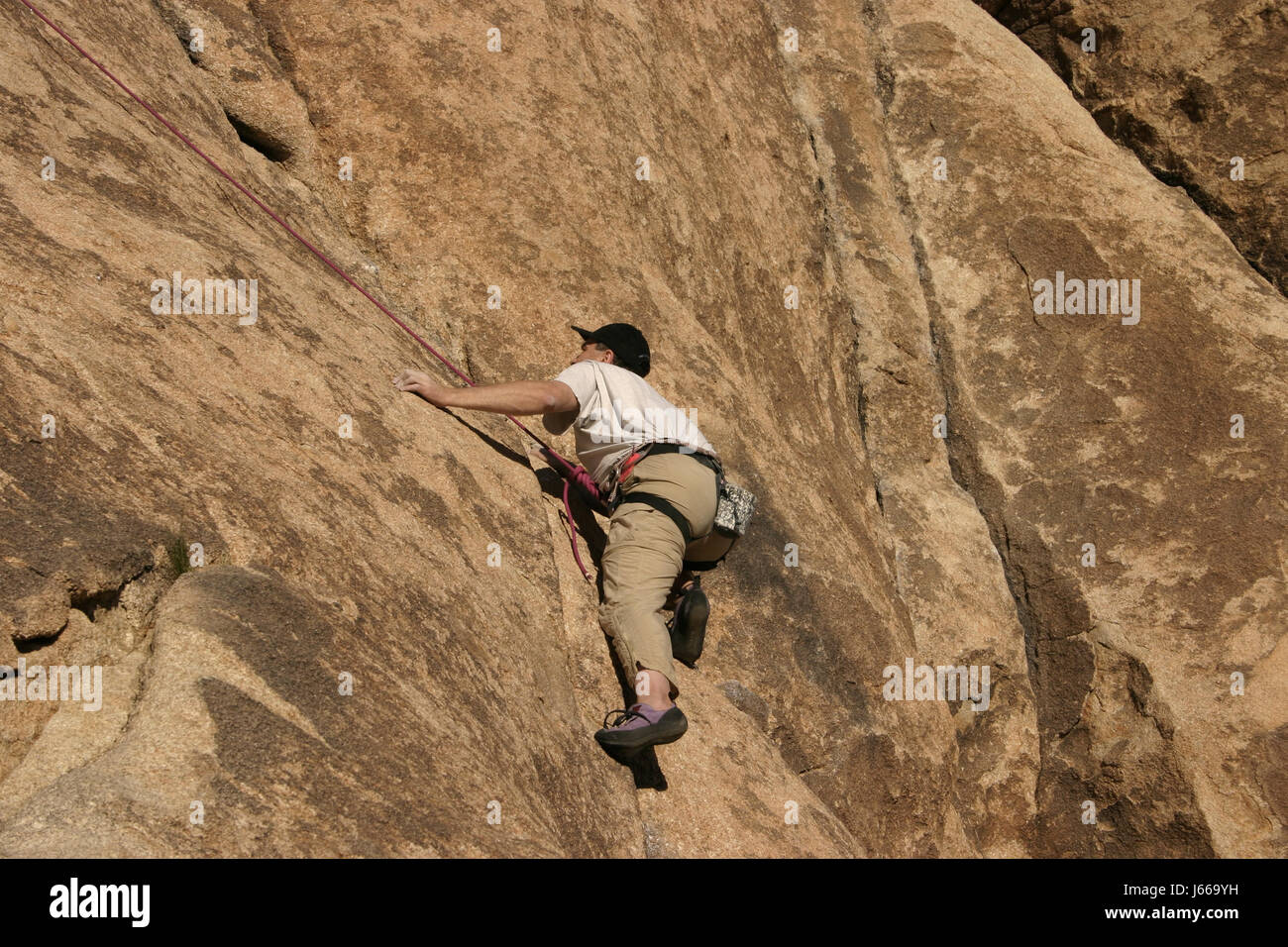 rise climb climbing ascend uphill tread clamber rope slab man rock ...