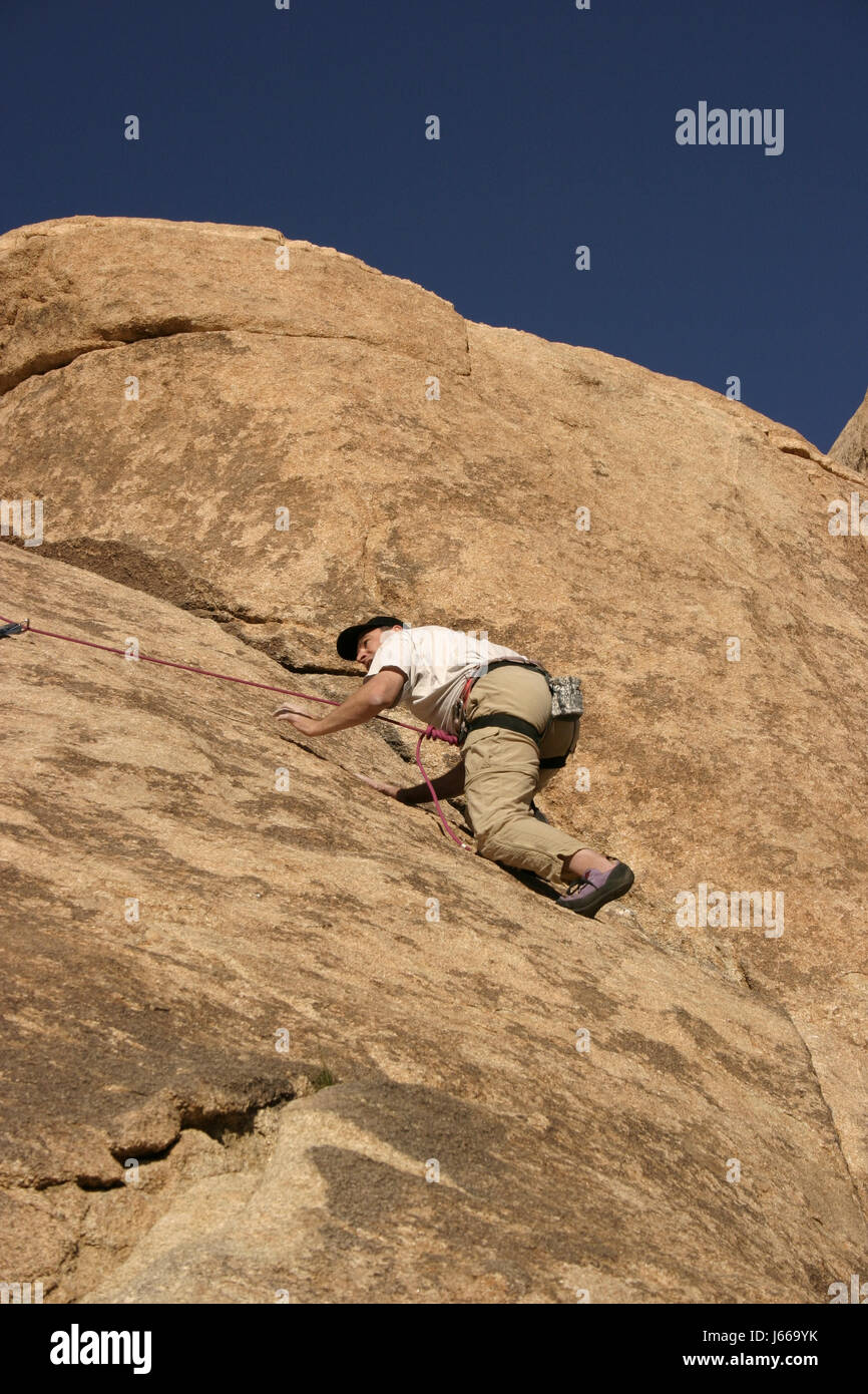 rise climb climbing ascend uphill tread clamber rope slab man rock ...