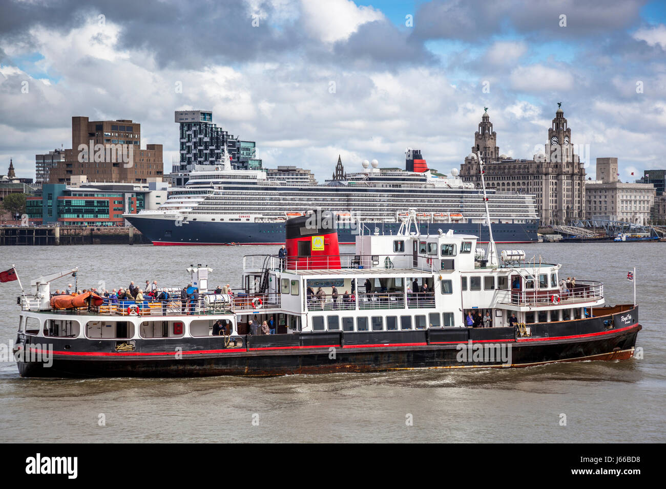Queen Elizabeth at the pierhead cruise terminal. Ferry the Royal Iris ...