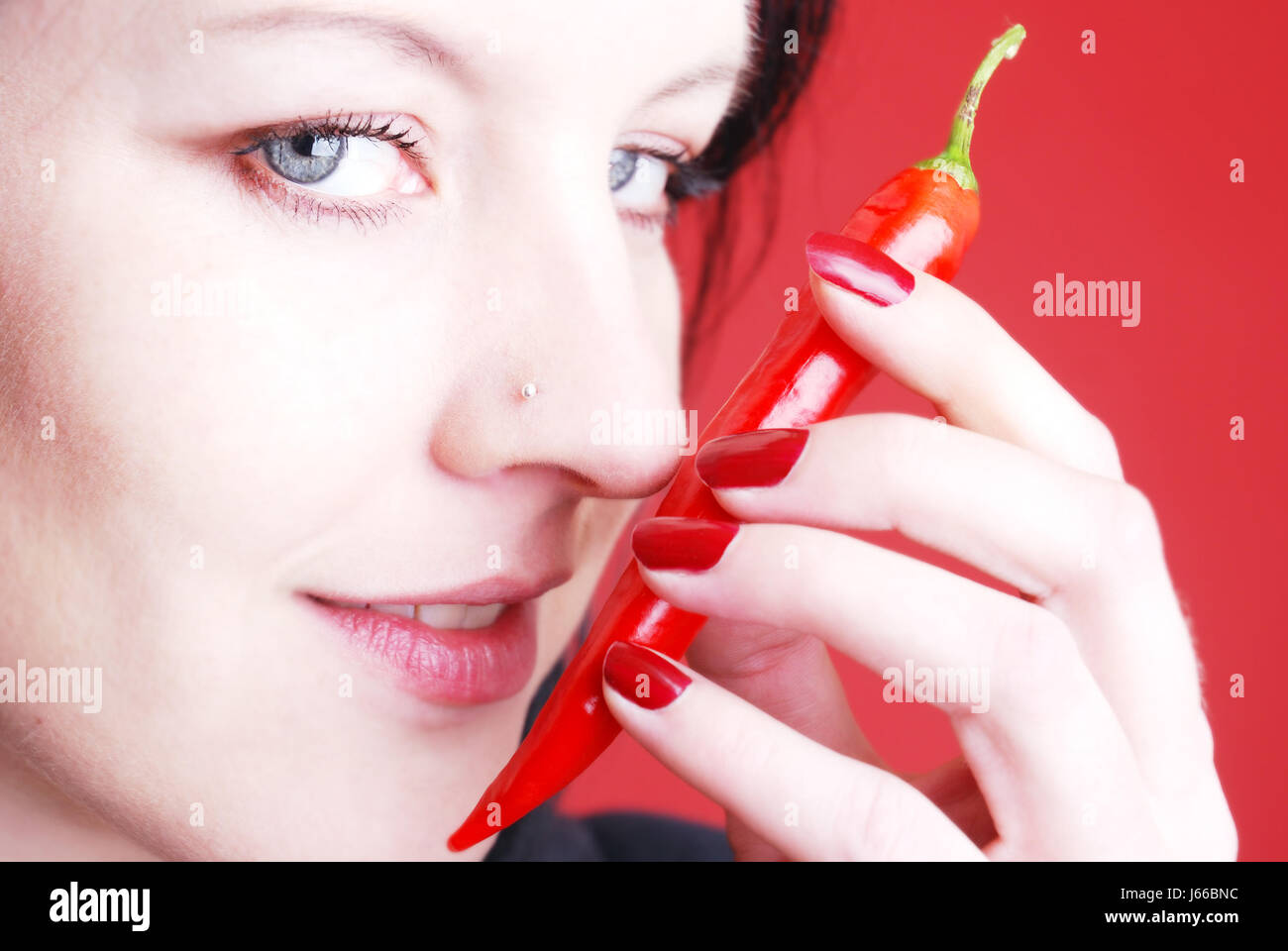 woman indicate show hold pepperoni red laugh laughs laughing twit ...