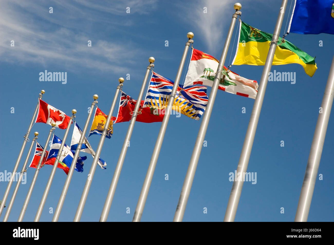 flag flags firmament sky blue green brown brownish brunette black ...