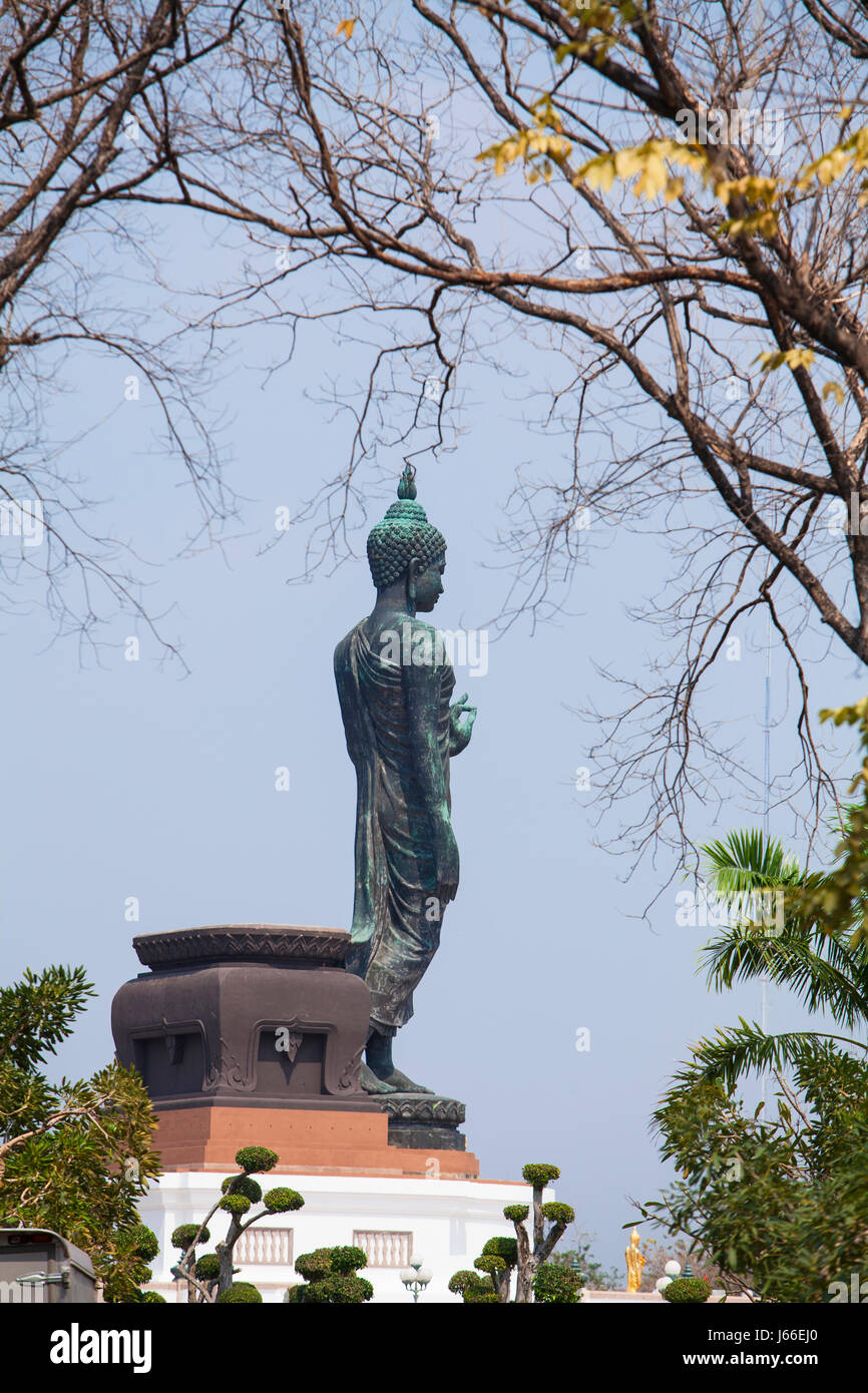 The old buddha statue stand on lotus in Thailand Stock Photo - Alamy