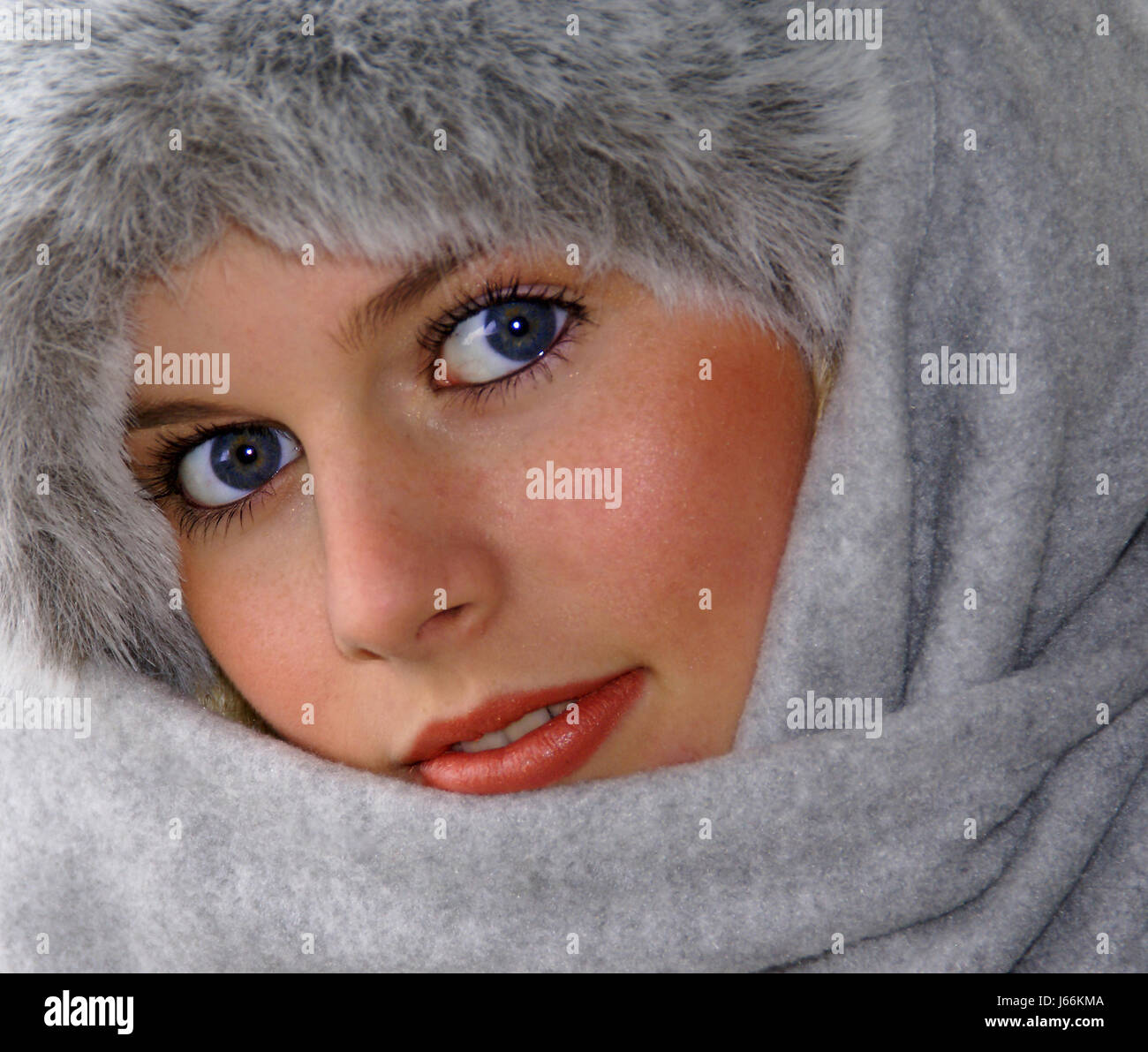 winter cold face teenager fur cap young younger girl girls blue laugh ...