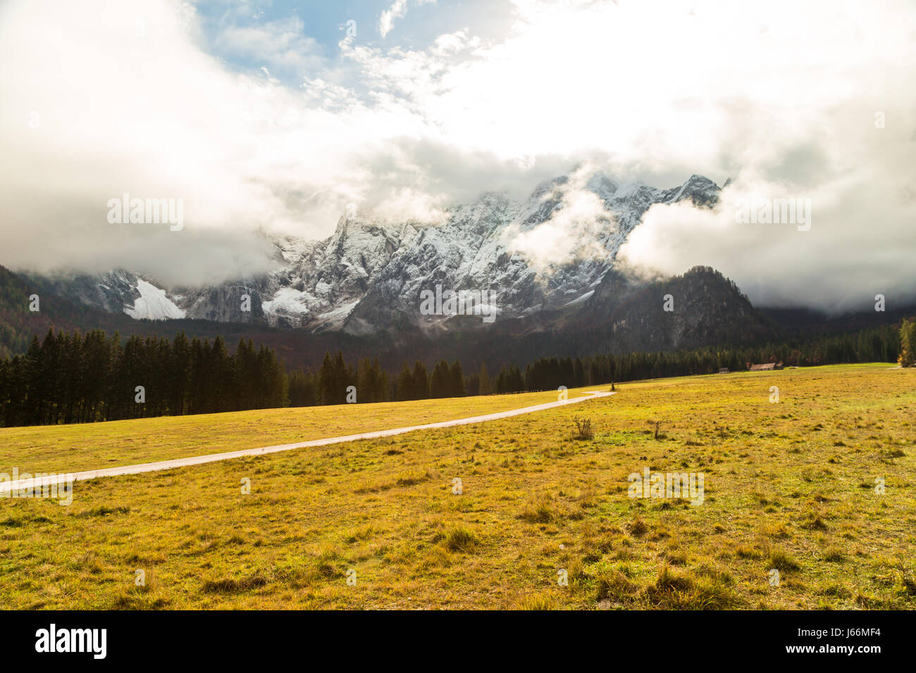 Fall in the italian alps in a misty day Stock Photo - Alamy