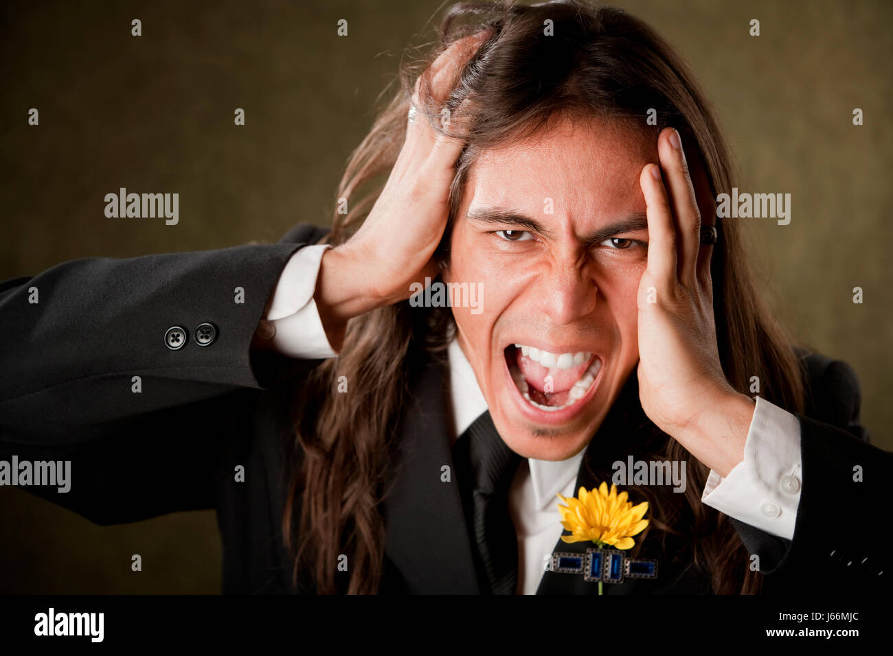 male masculine frustration yell tense shock man hand flower plant mouth ...