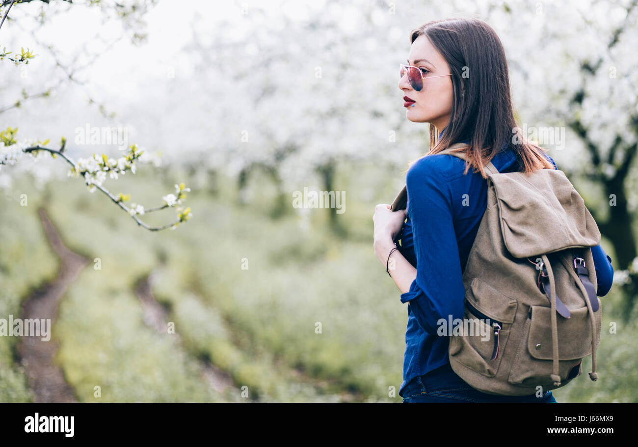 Young woman walking in nature Stock Photo - Alamy
