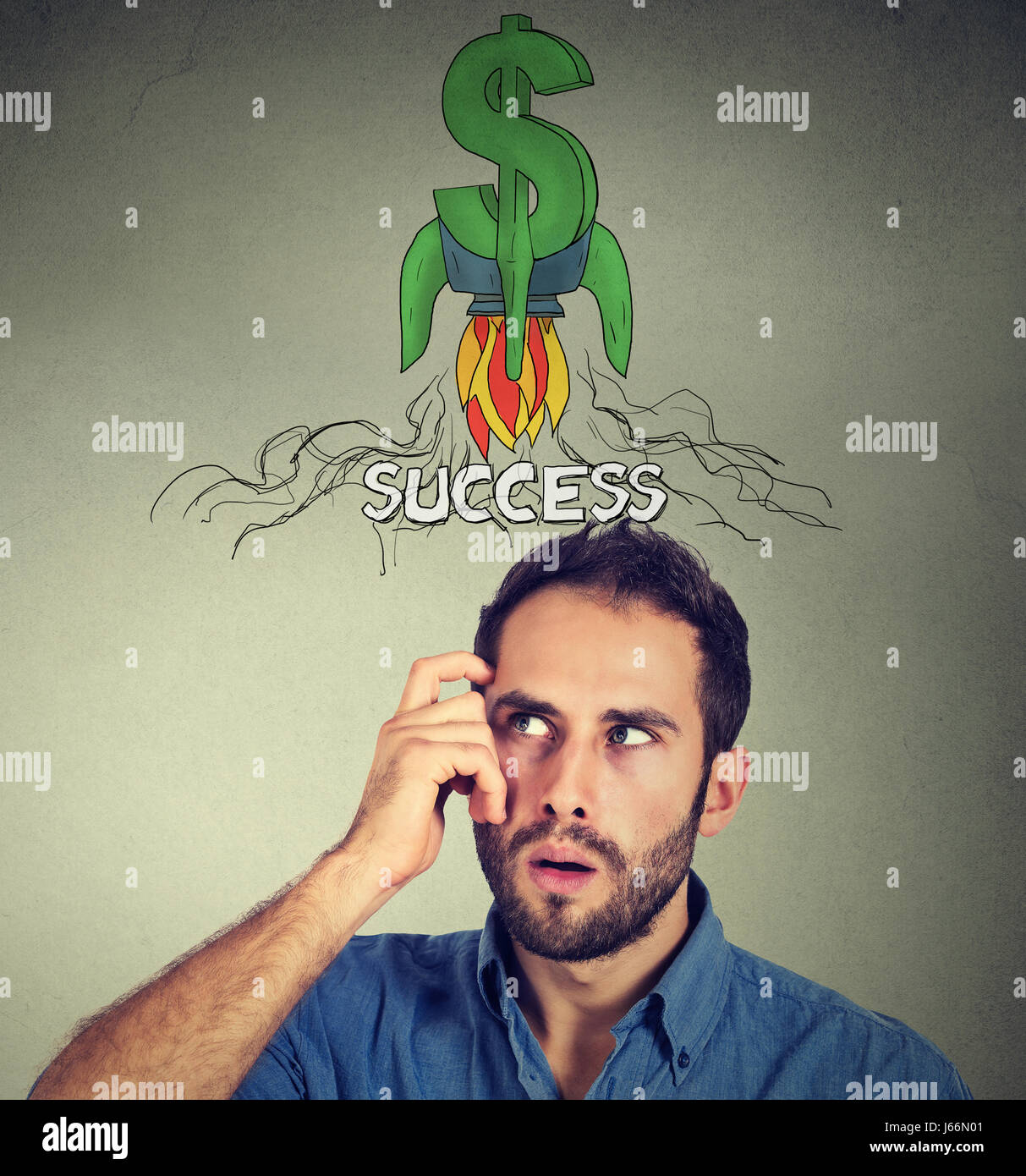 Financial business success concept. Thoughtful young man looking up at ...