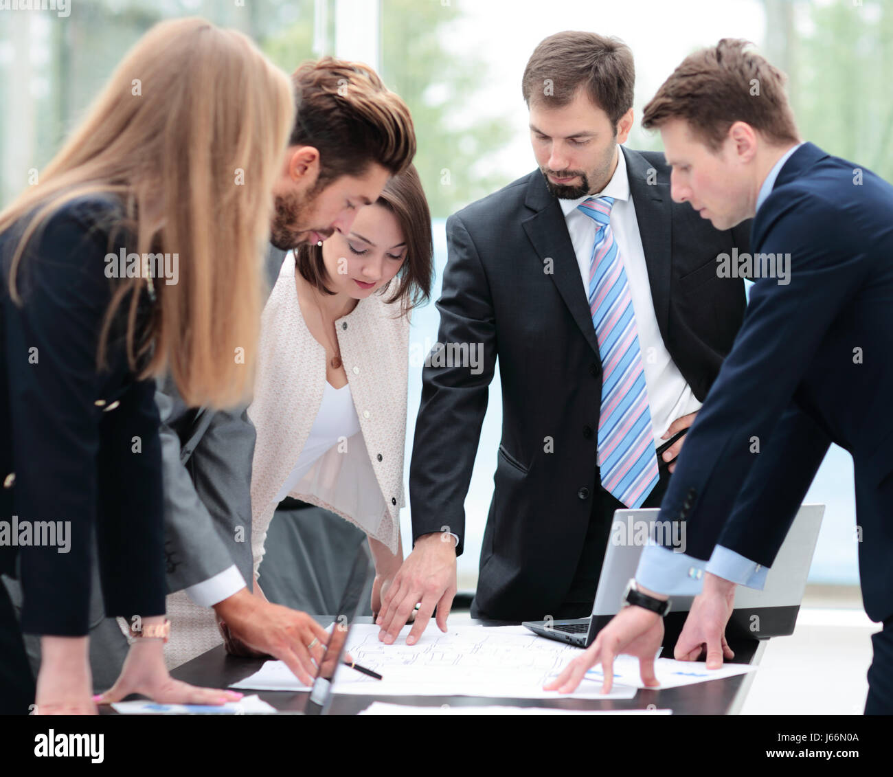 Successful team of coworkers making great meeting discussion in modern ...